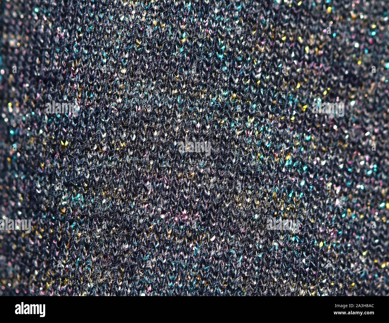 Colorful detailed fabric textures of different cloth types in a close ...