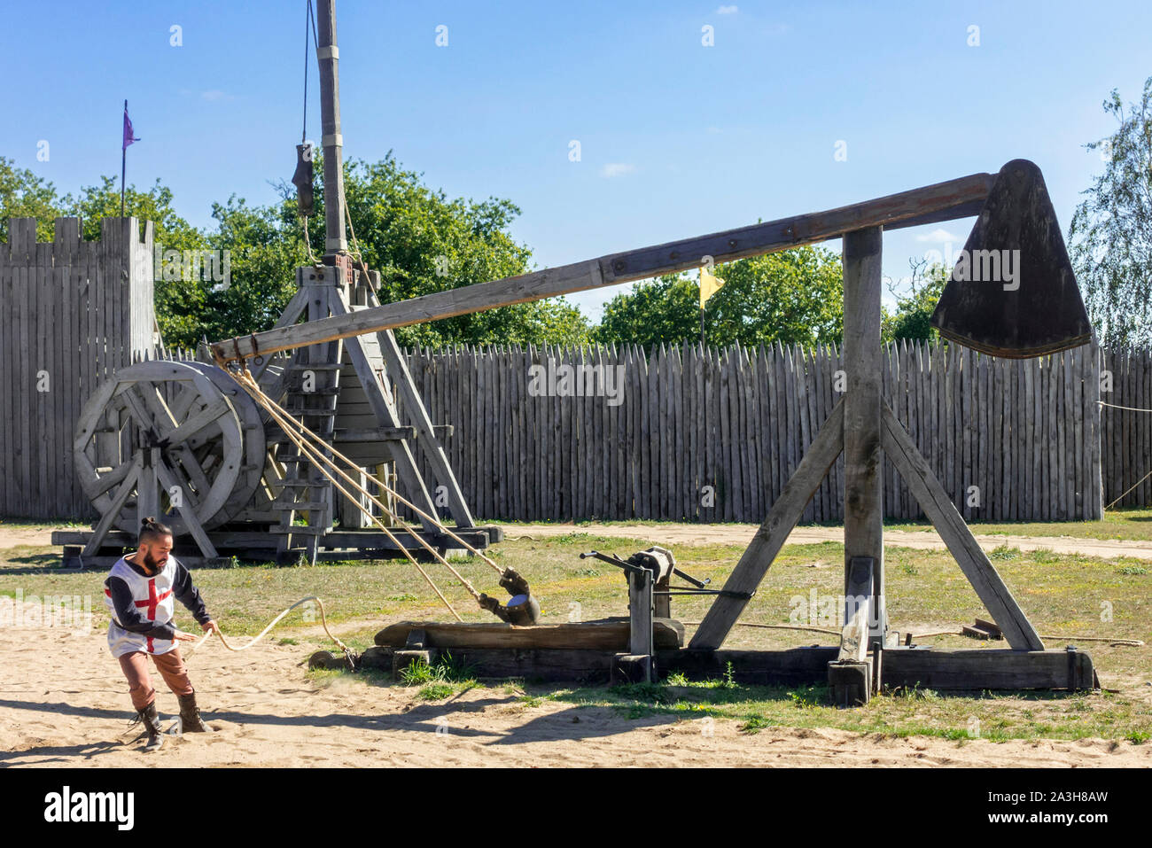 Reenactor playing medieval soldier firing couillard, counterweight ...