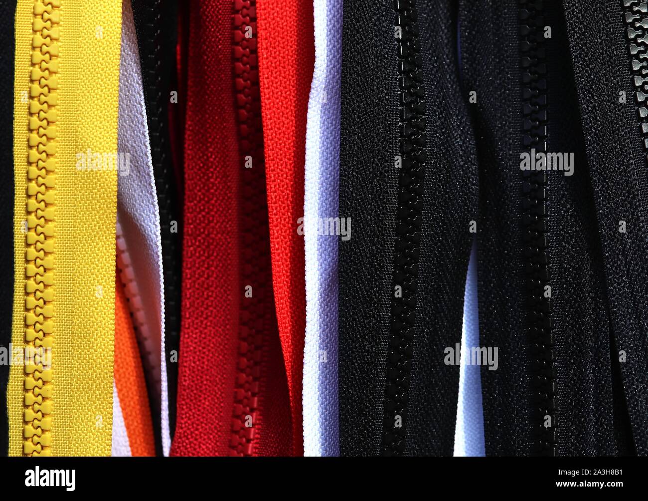 Colorful detailed fabric textures of different cloth types in a close ...
