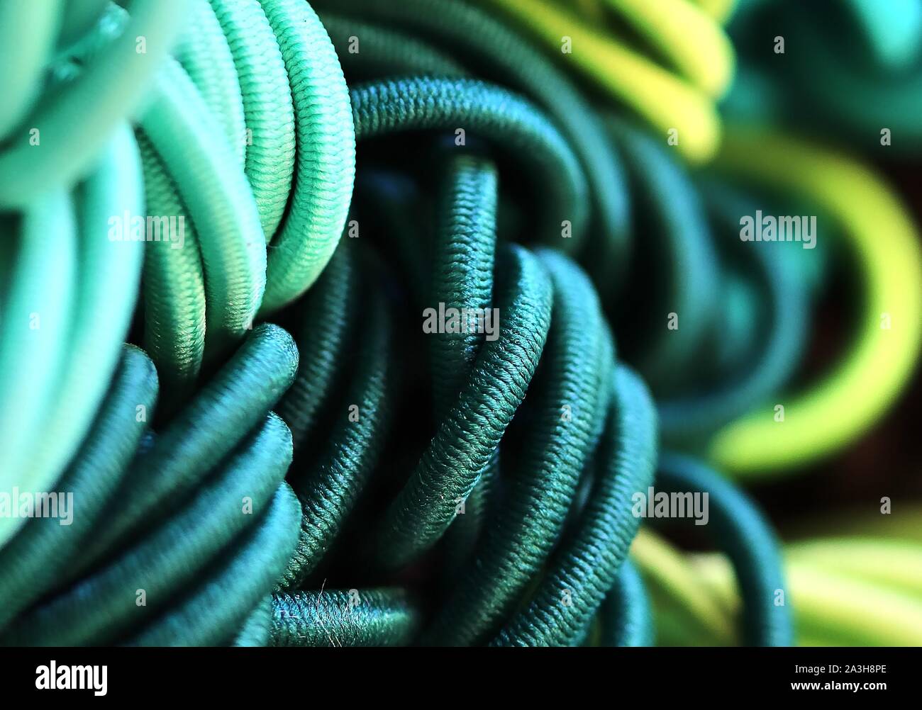 Colorful detailed fabric textures of different cloth types in a close ...