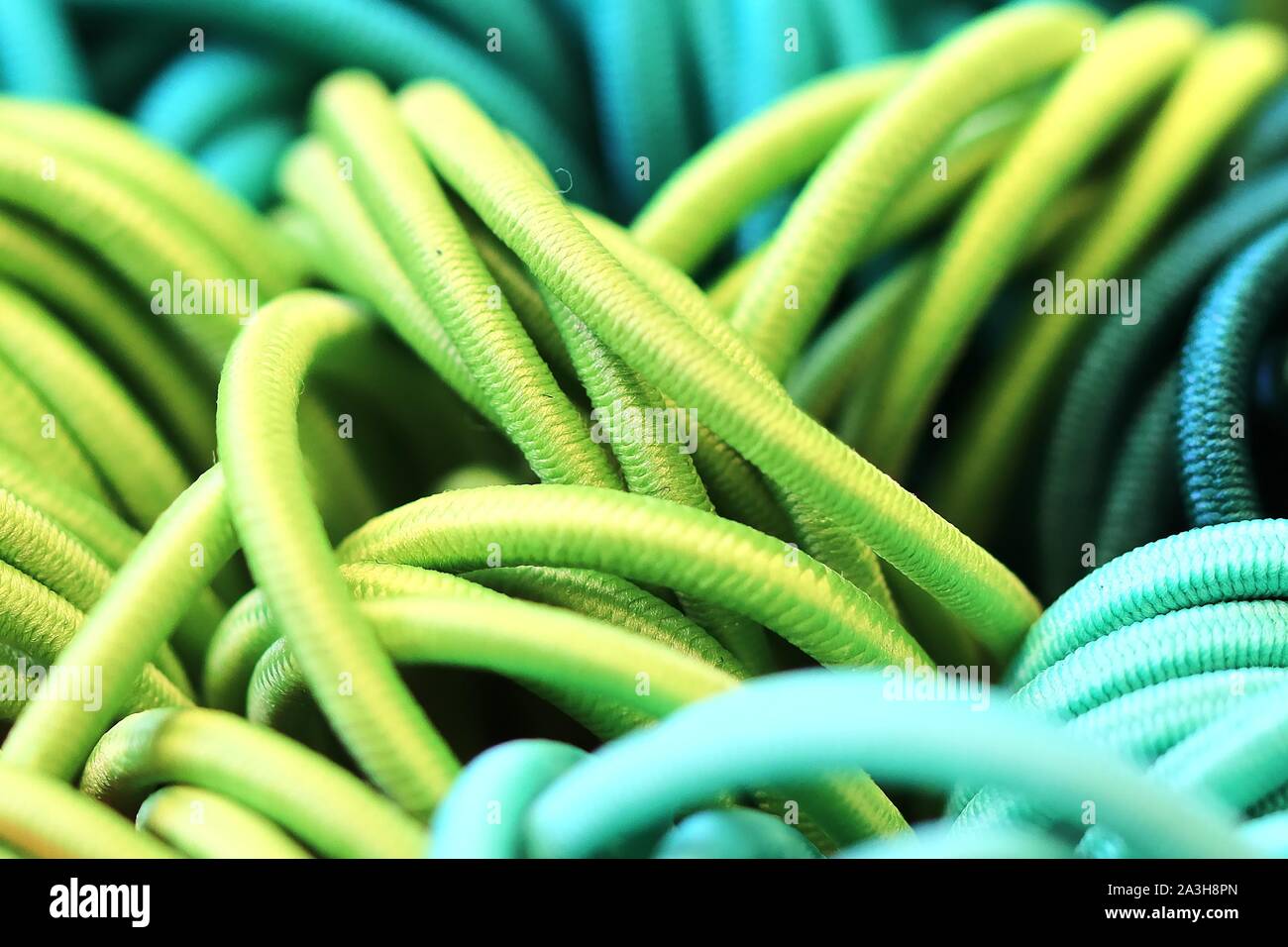 Colorful detailed fabric textures of different cloth types in a close ...