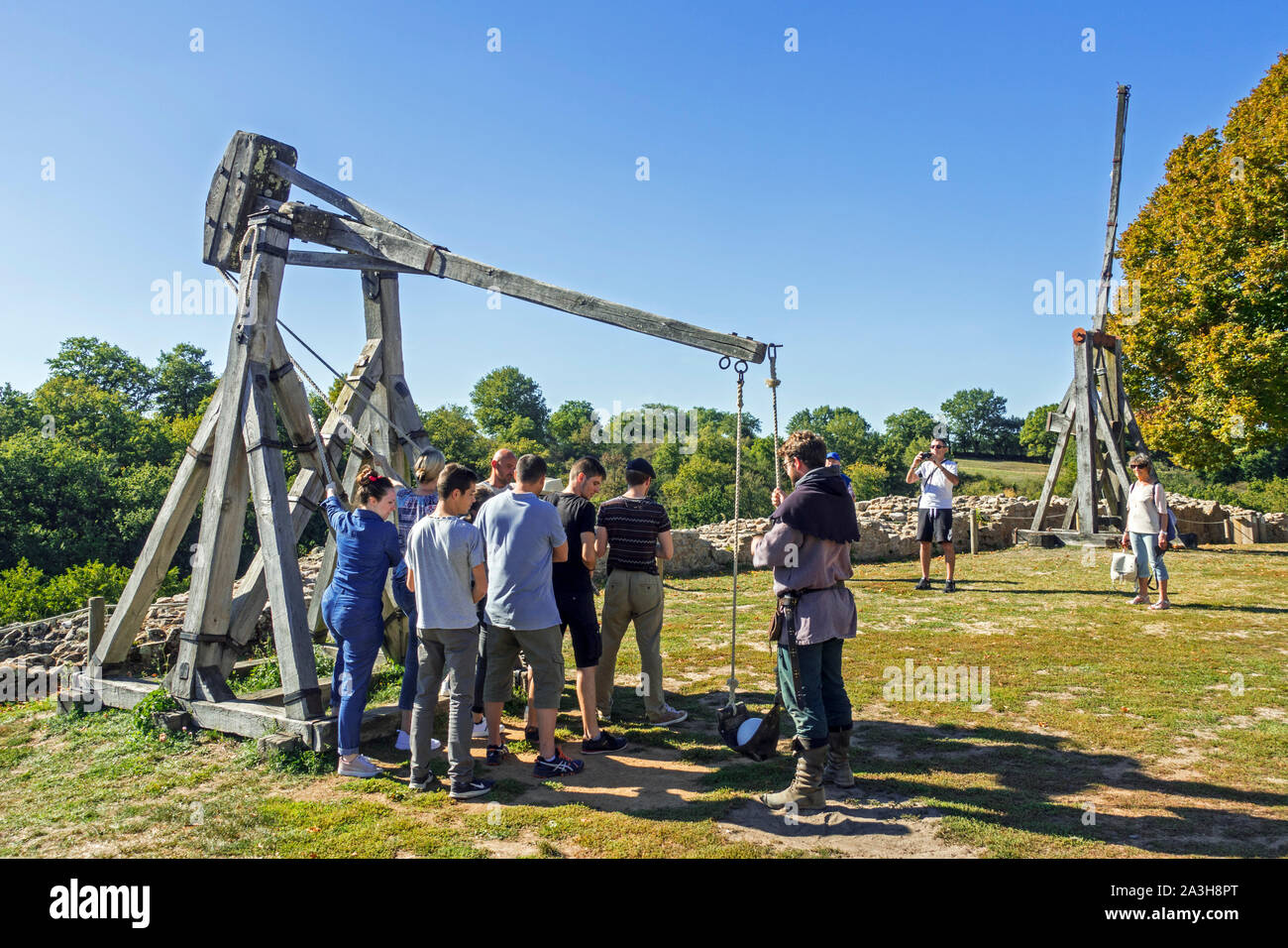 Visitors operating bricole / mangonel / traction trebuchet, medieval ...