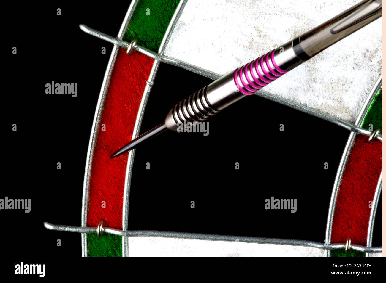Dartboard with dart close up edge detail Stock Photo - Alamy