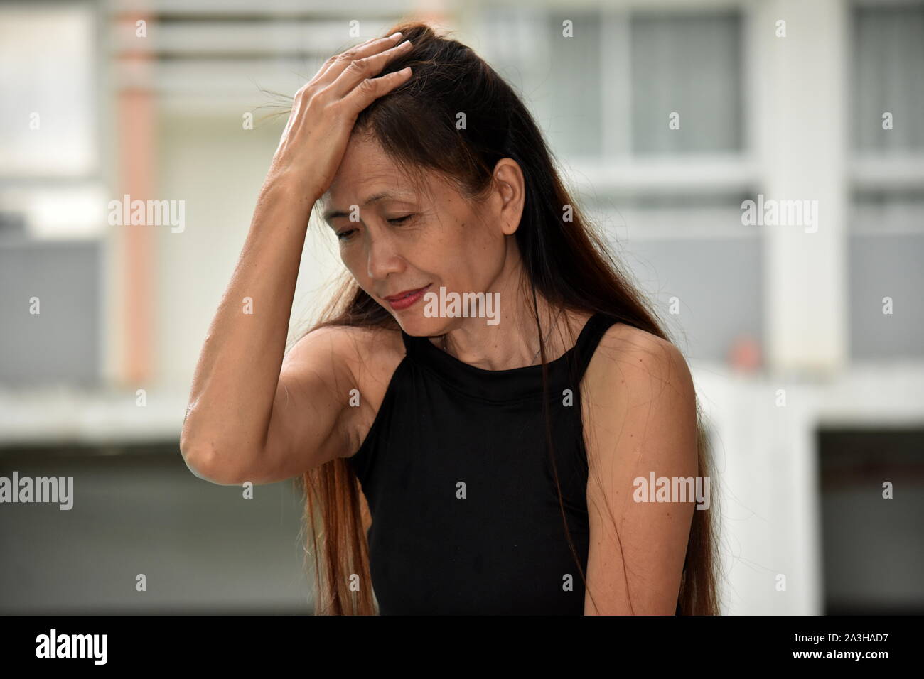 An Adult Female And Sadness Stock Photo - Alamy