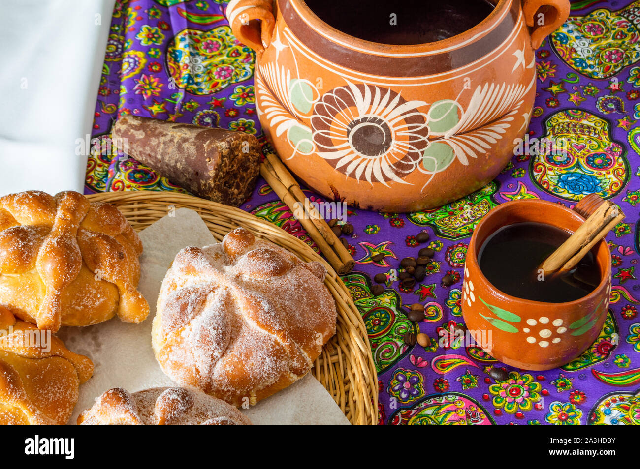 Traditional Mexican bread of the dead (pan de muerto) served with ...