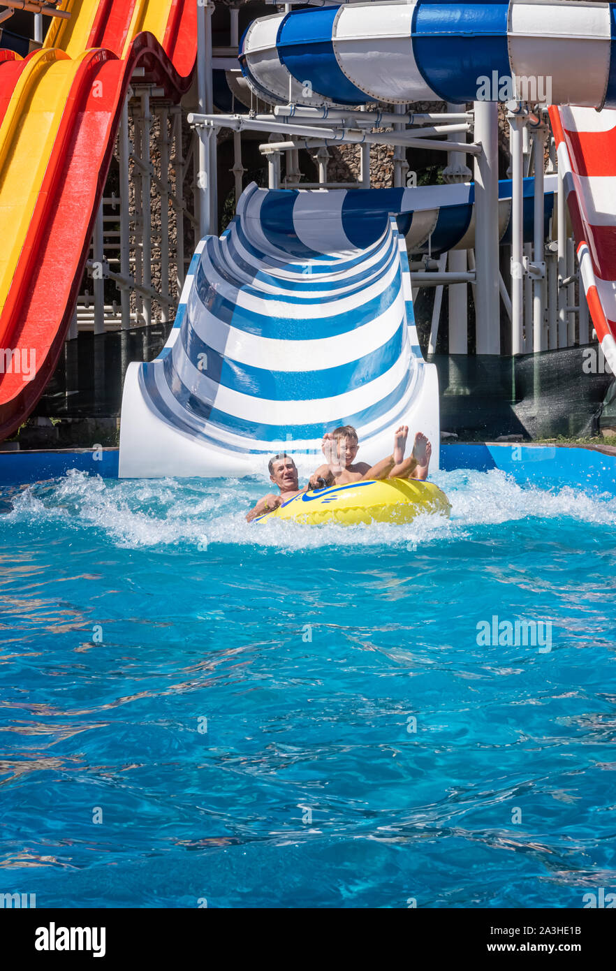 Water slide family hi-res stock photography and images - Alamy