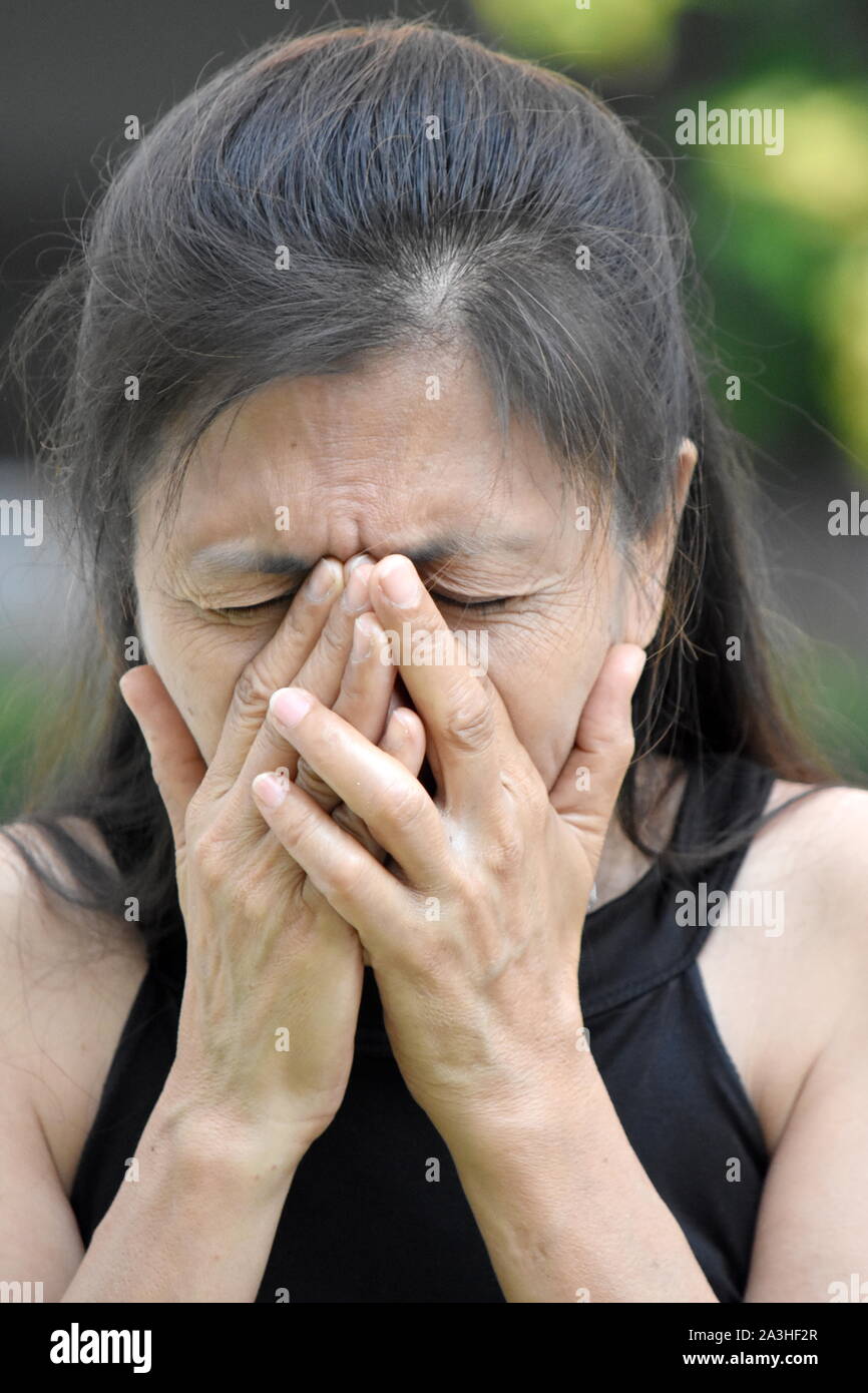 Old lady crying hi-res stock photography and images - Alamy