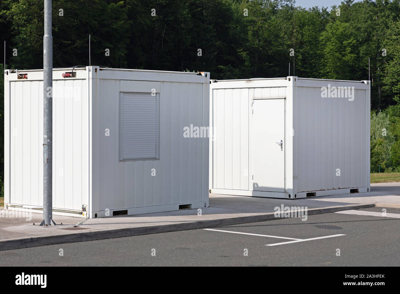 Two White Cargo Containers Converted in ROoms Stock Photo - Alamy