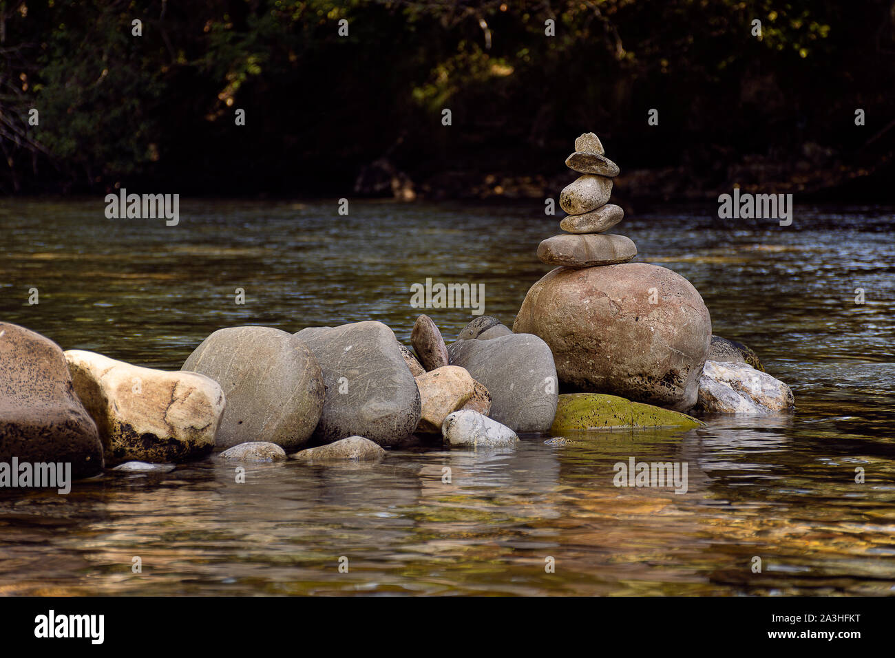 stacked rocks in a very calm river Stock Photo - Alamy stacked rocks in a very calm river Stock Photo - Alamy