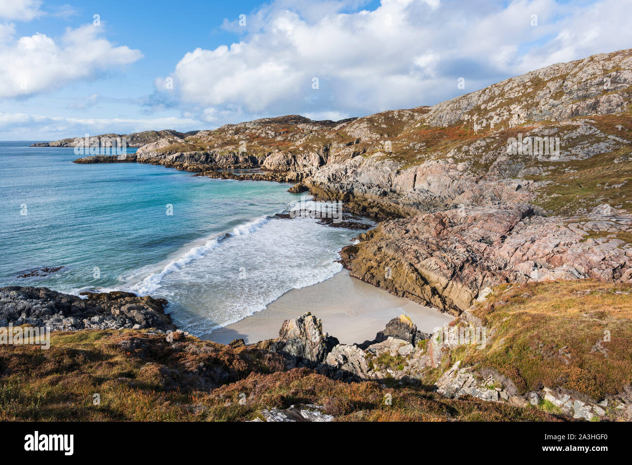 Remote beach on the shore of Achmelvich Bay in Assynt, Sutherland in ...