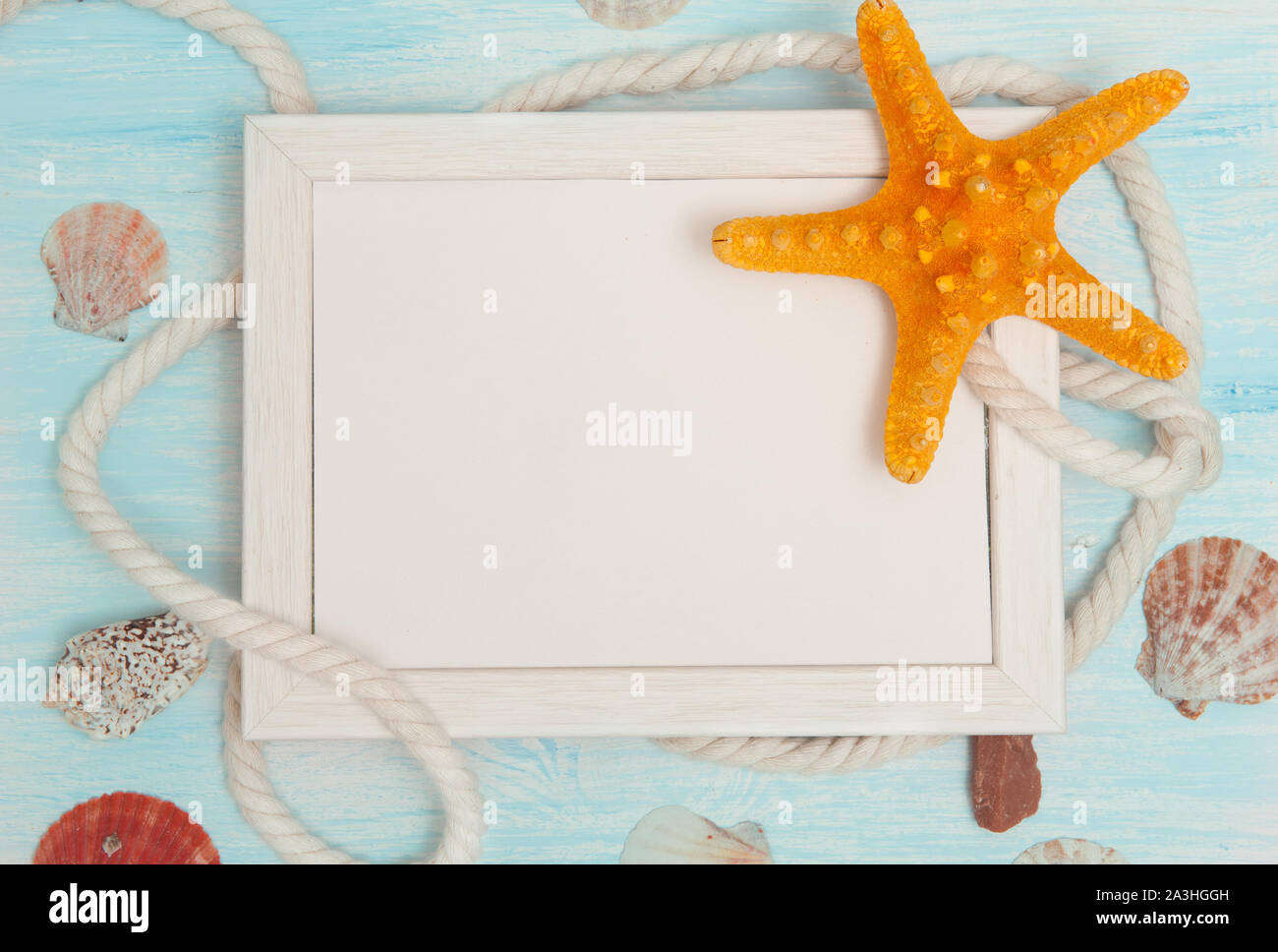 Sea background with blue wood, rope, starfish shells Stock Photo - Alamy
