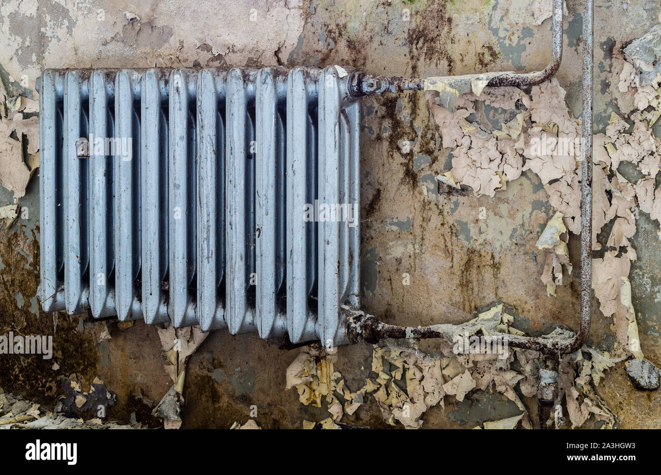 Old heating after water damage Stock Photo - Alamy