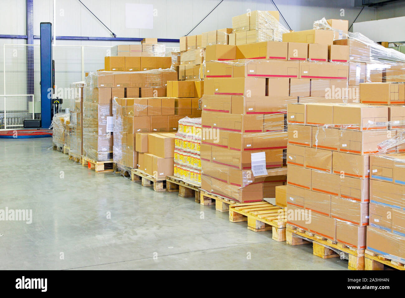 Big pile of box package in warehouse Stock Photo - Alamy