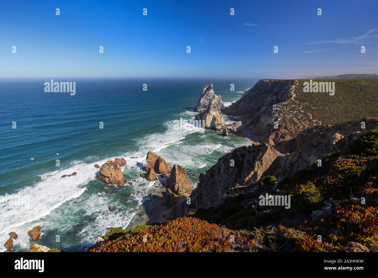 Scenic view of the Atlantic Ocean and rugged coast with huge boulders ...