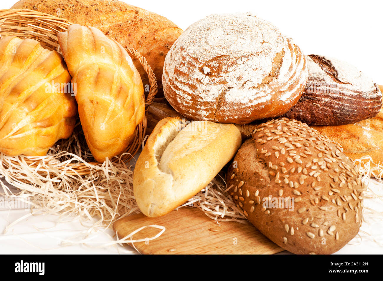 Several types of black and white bread on a white background Stock ...
