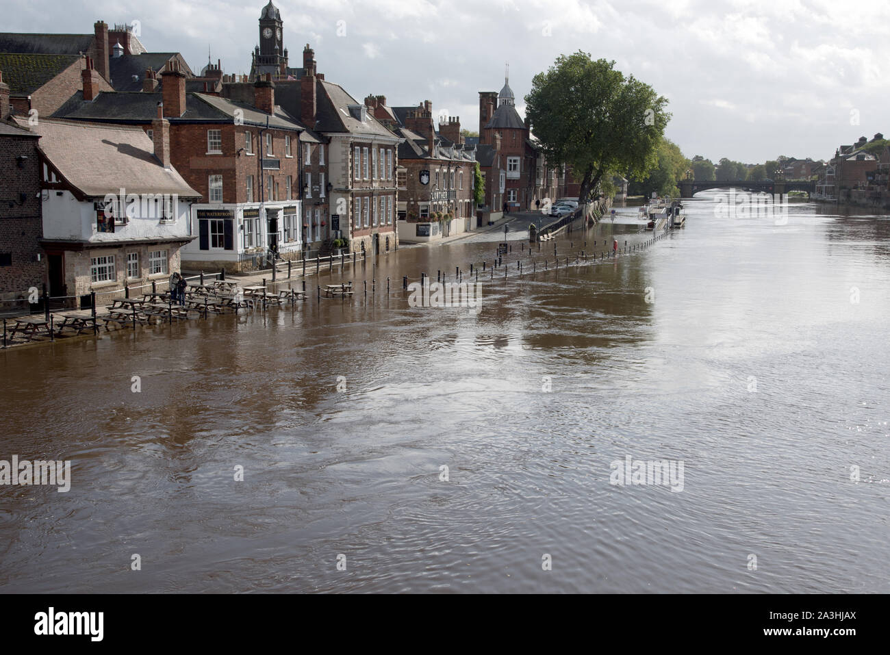 The over flowing waters of the River Ouse in York UK starting to recede ...