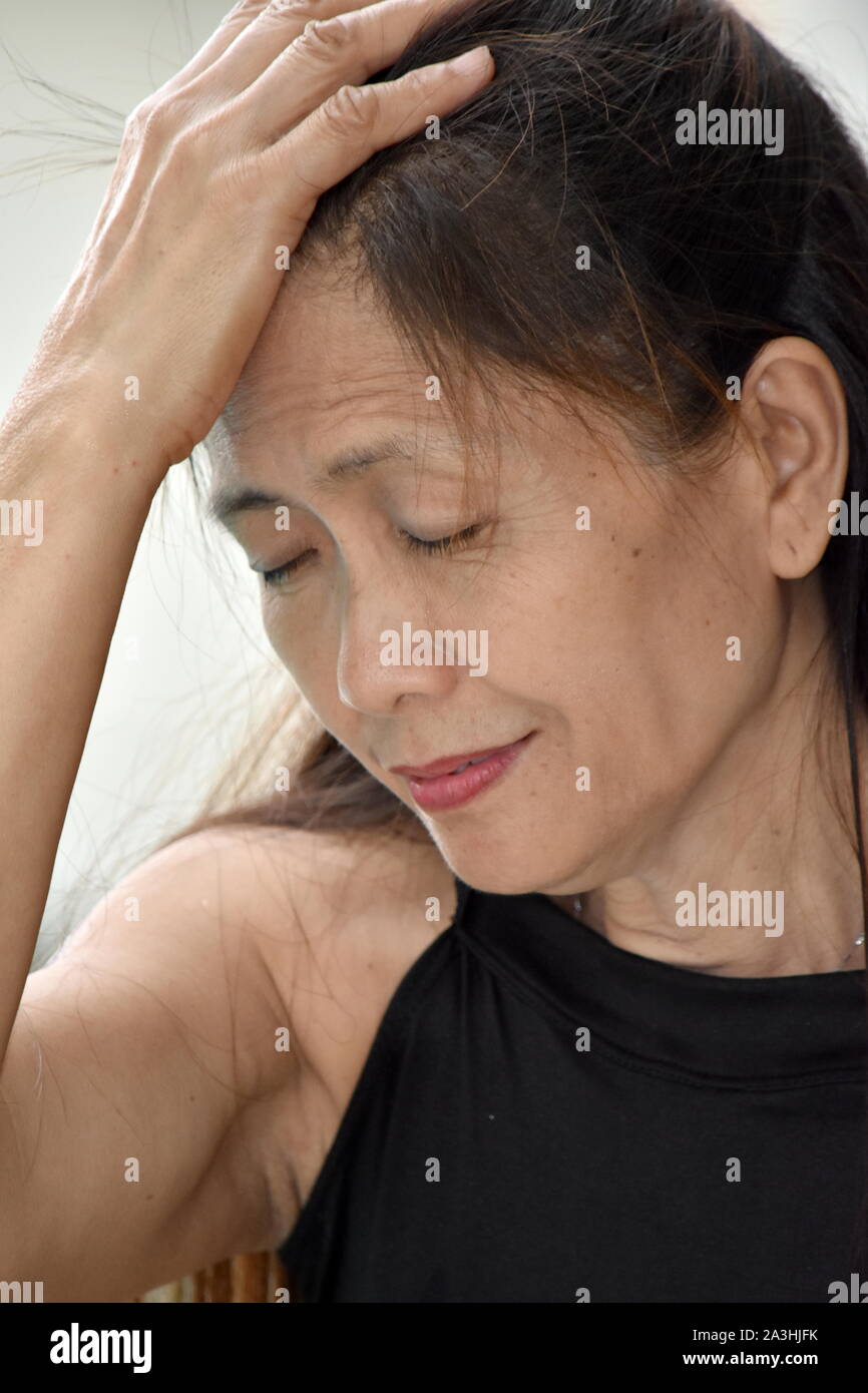 An Unhappy Female Senior Grandma Stock Photo - Alamy