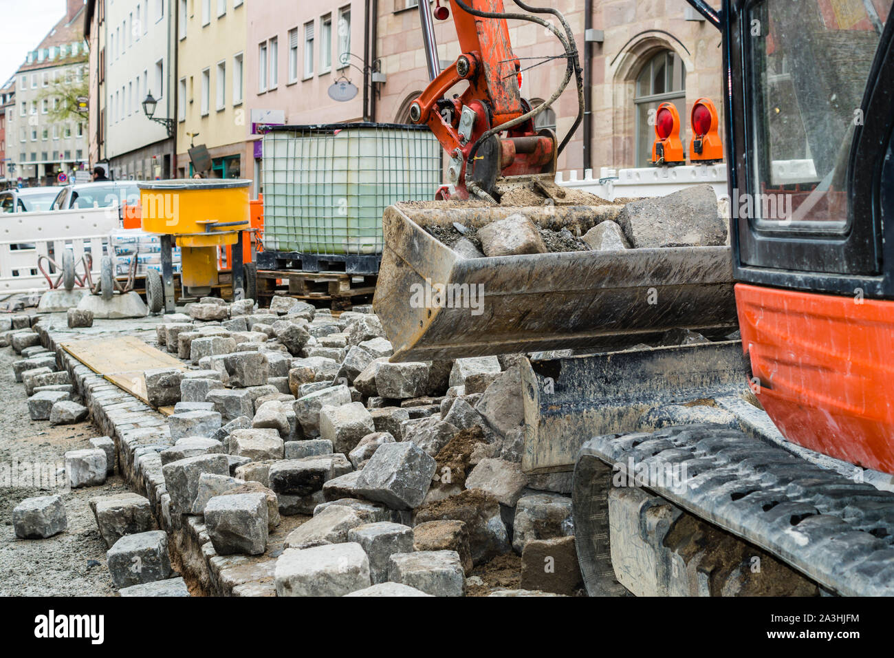Excavator for road construction Stock Photo - Alamy