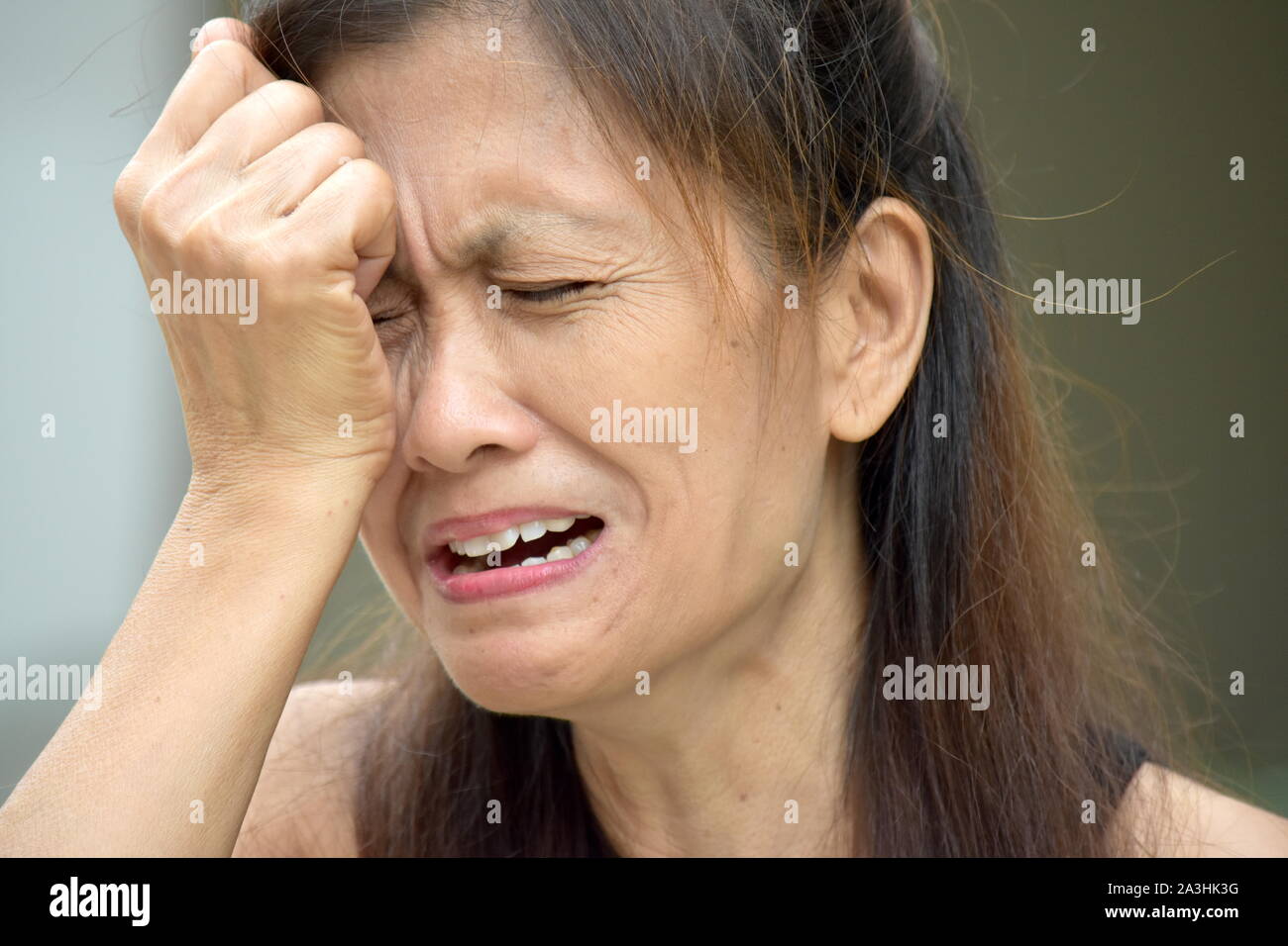 Woman crying sad tearful hi-res stock photography and images - Alamy