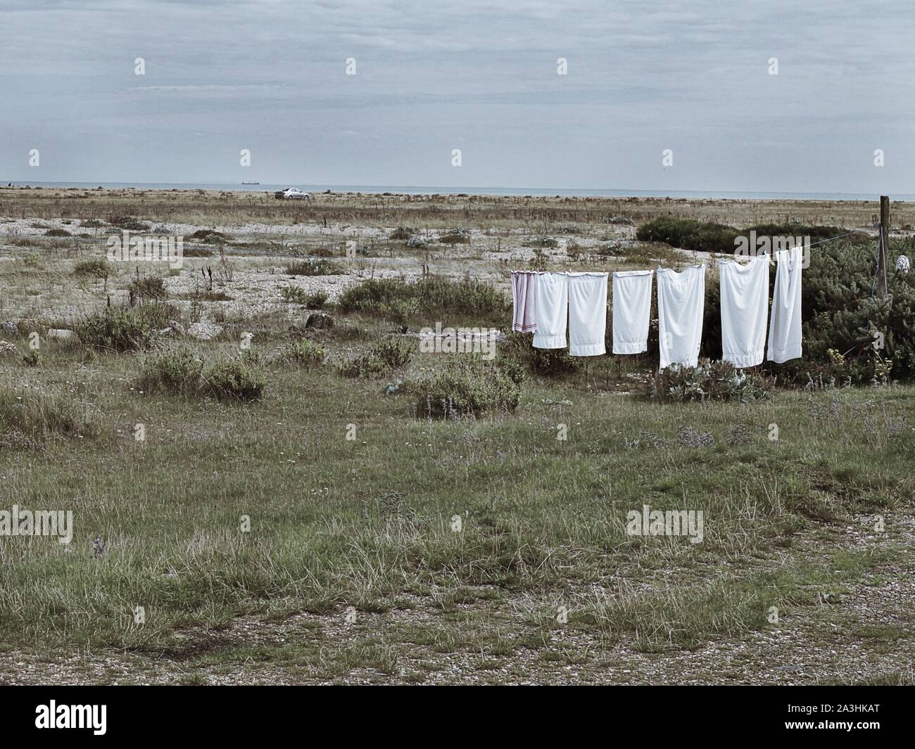 White washing drying in a washing line Stock Photo - Alamy