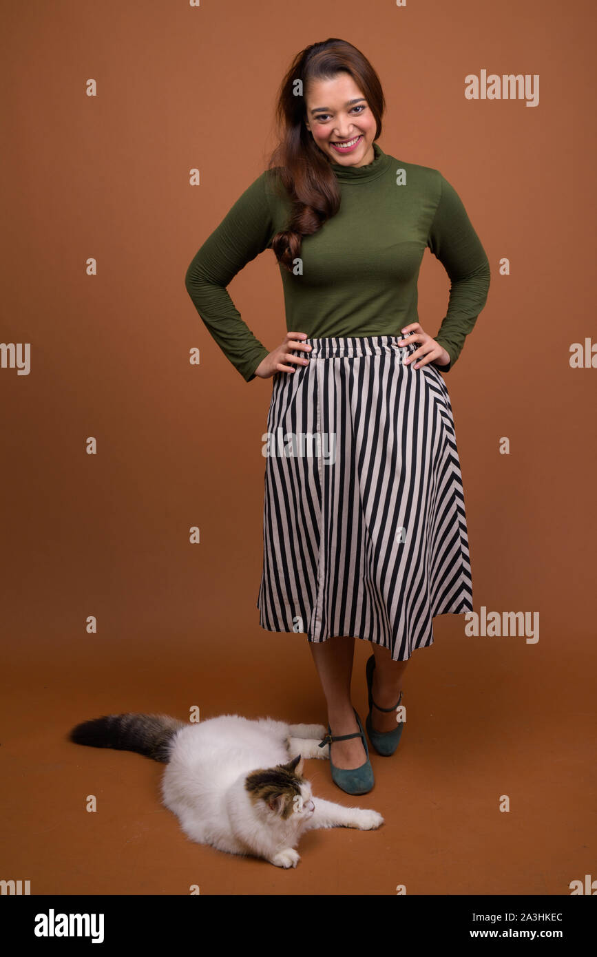 Indian girl with pet cat hi-res stock photography and images - Alamy