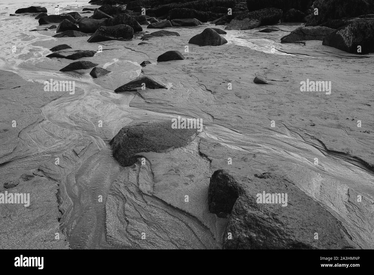 Striations and grooves in sand during low tide at Sand Beach in Acadia ...
