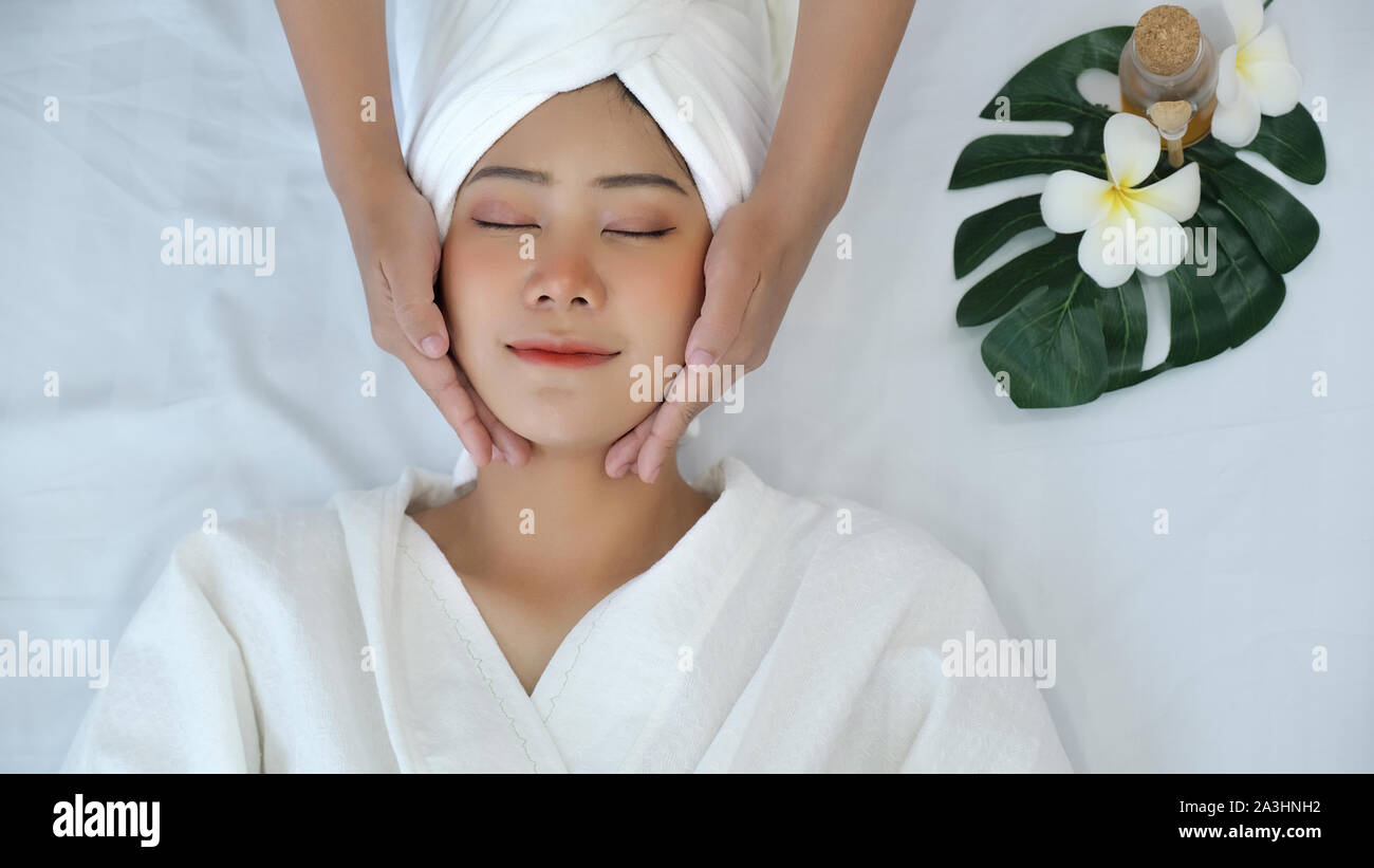 Leisure asian young woman in spa salon. Massage and treatment spa room ...