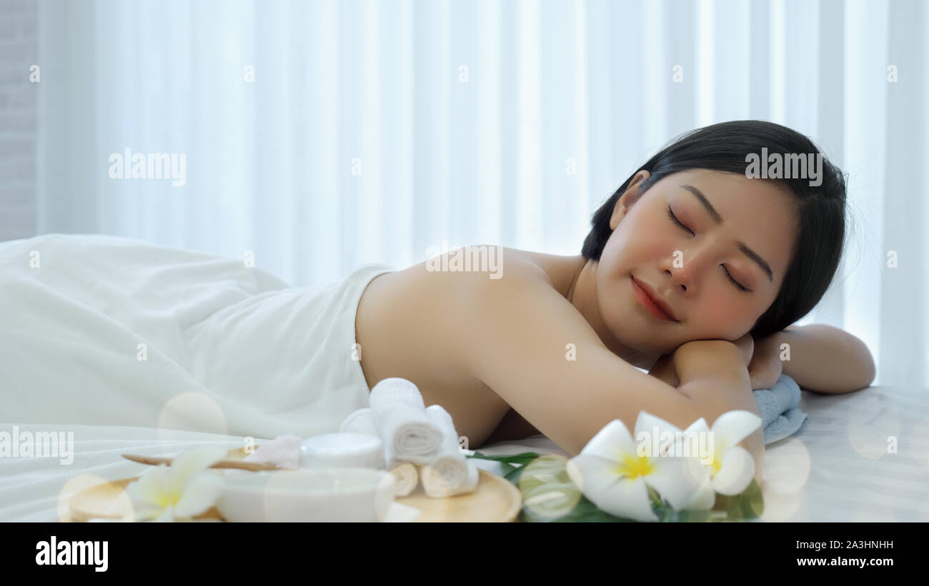 Leisure asian young woman in spa salon. Massage and treatment spa room ...