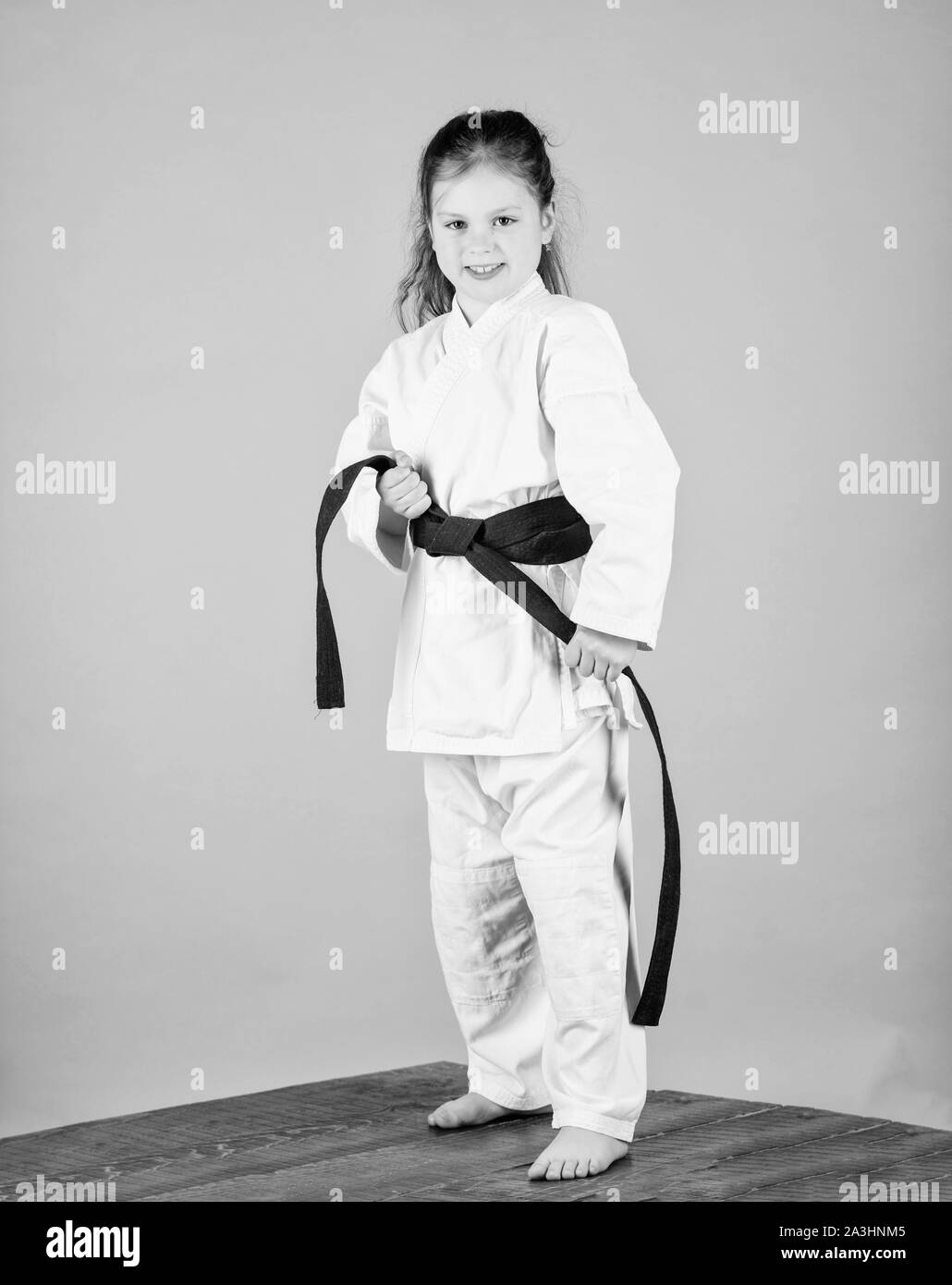 Activity and sport. Karate gives feeling of confidence. Strong and ...