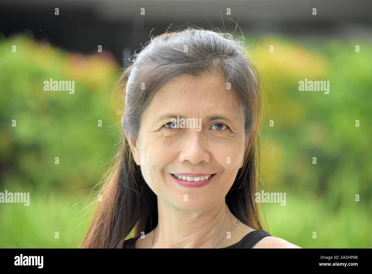 Smiling attractive senior women hi-res stock photography and images - Alamy