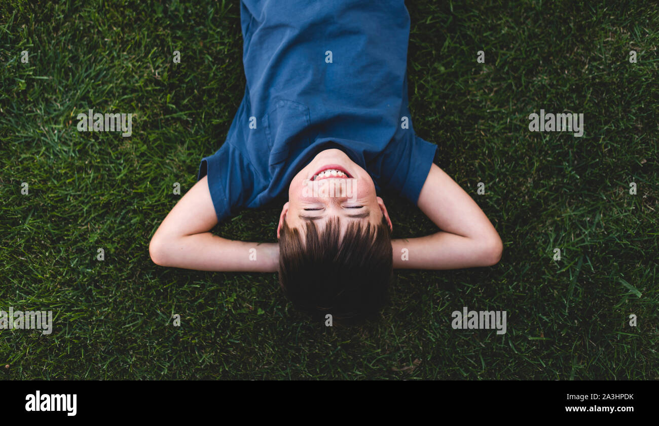 Child laying hi-res stock photography and images - Alamy
