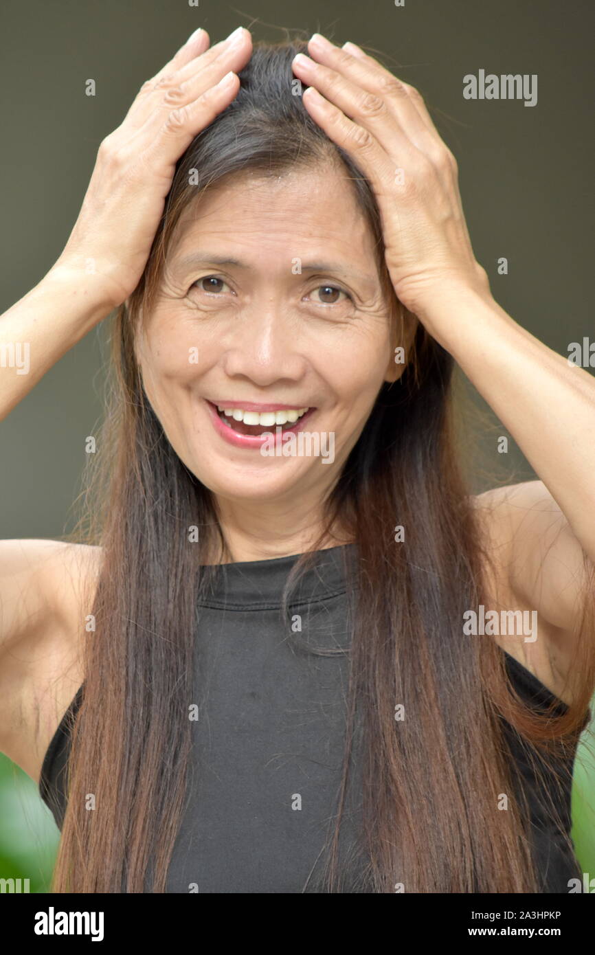 A Forgetful Minority Woman Stock Photo - Alamy