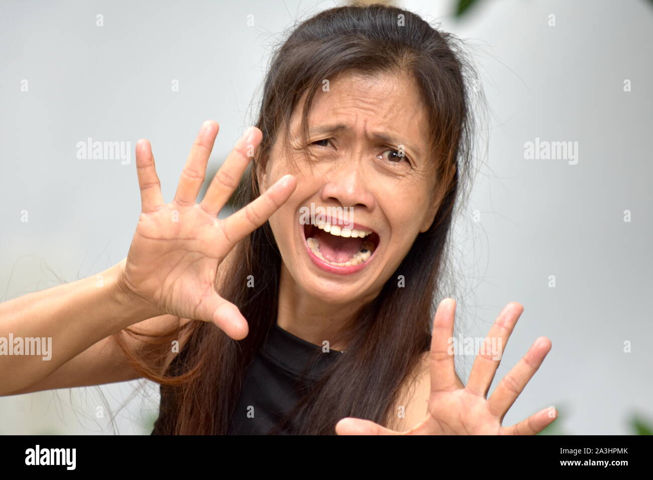 Scared senior woman hi-res stock photography and images - Alamy