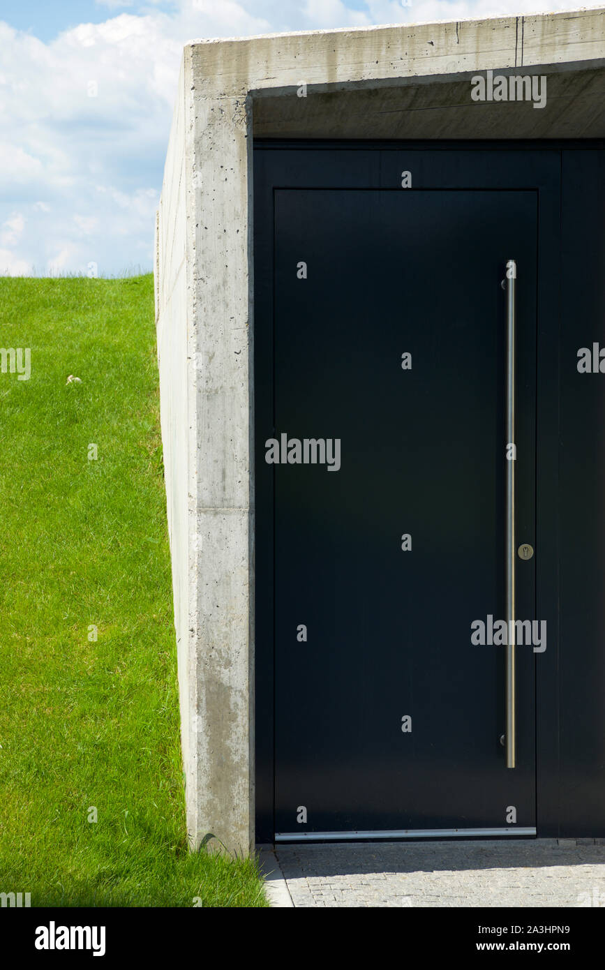 Entrance door to an underground installation Stock Photo - Alamy