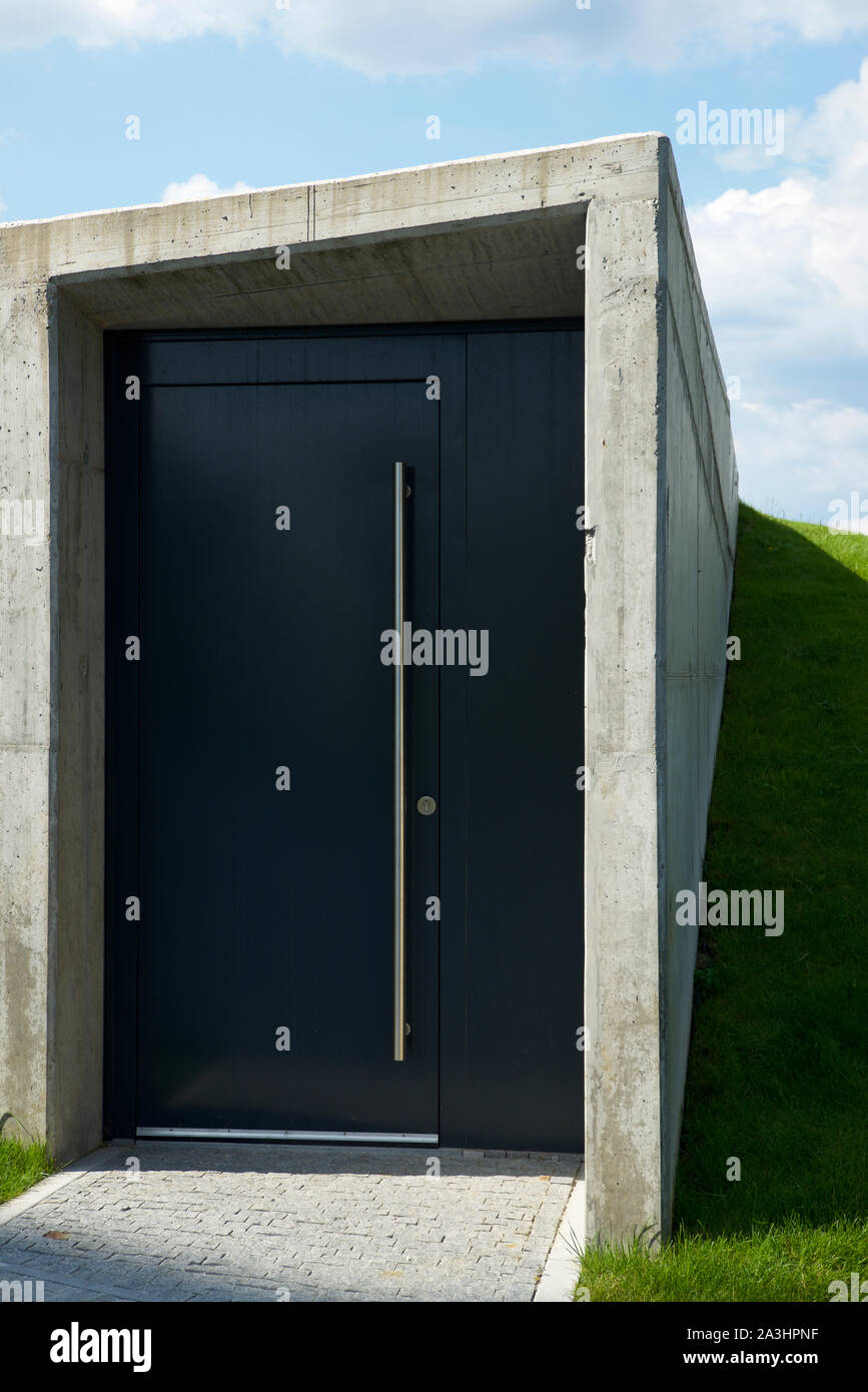 Entrance door to an underground installation Stock Photo - Alamy