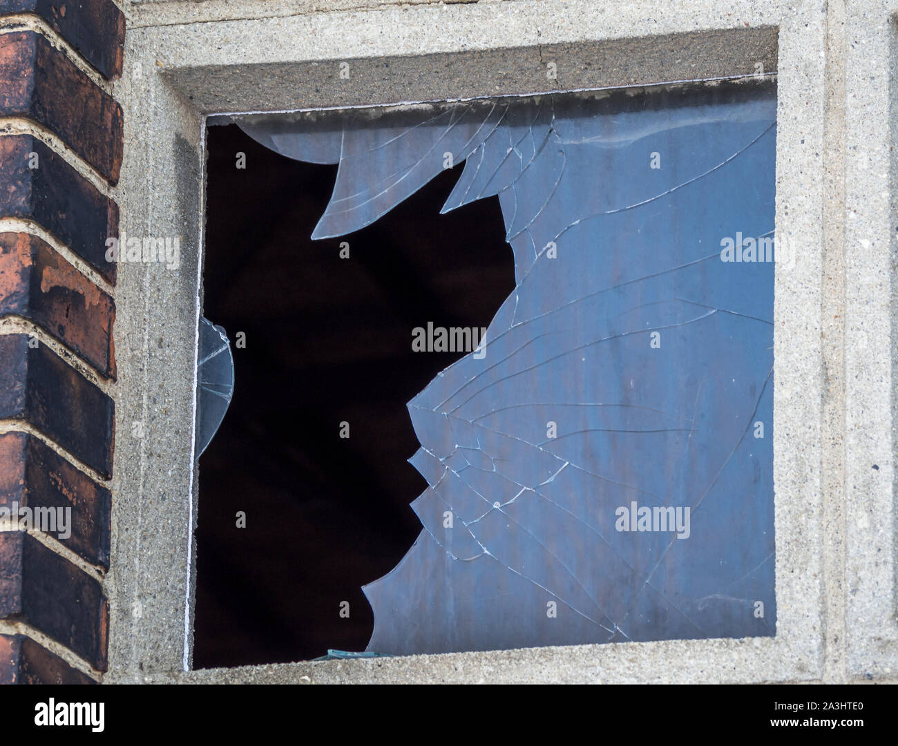 Burglary with broken window pane Stock Photo - Alamy