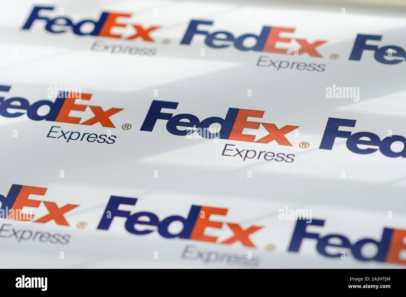 Multiple FedEX logos on a large canvas with the natural sunlight ...