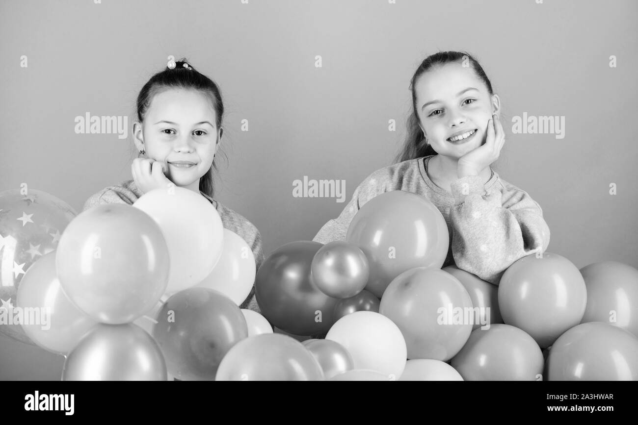 Happiness and cheerful moments. Carefree childhood. Sisters organize ...