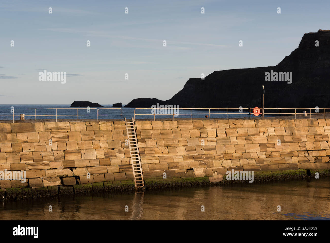 Whitby East pier wall Stock Photo - Alamy