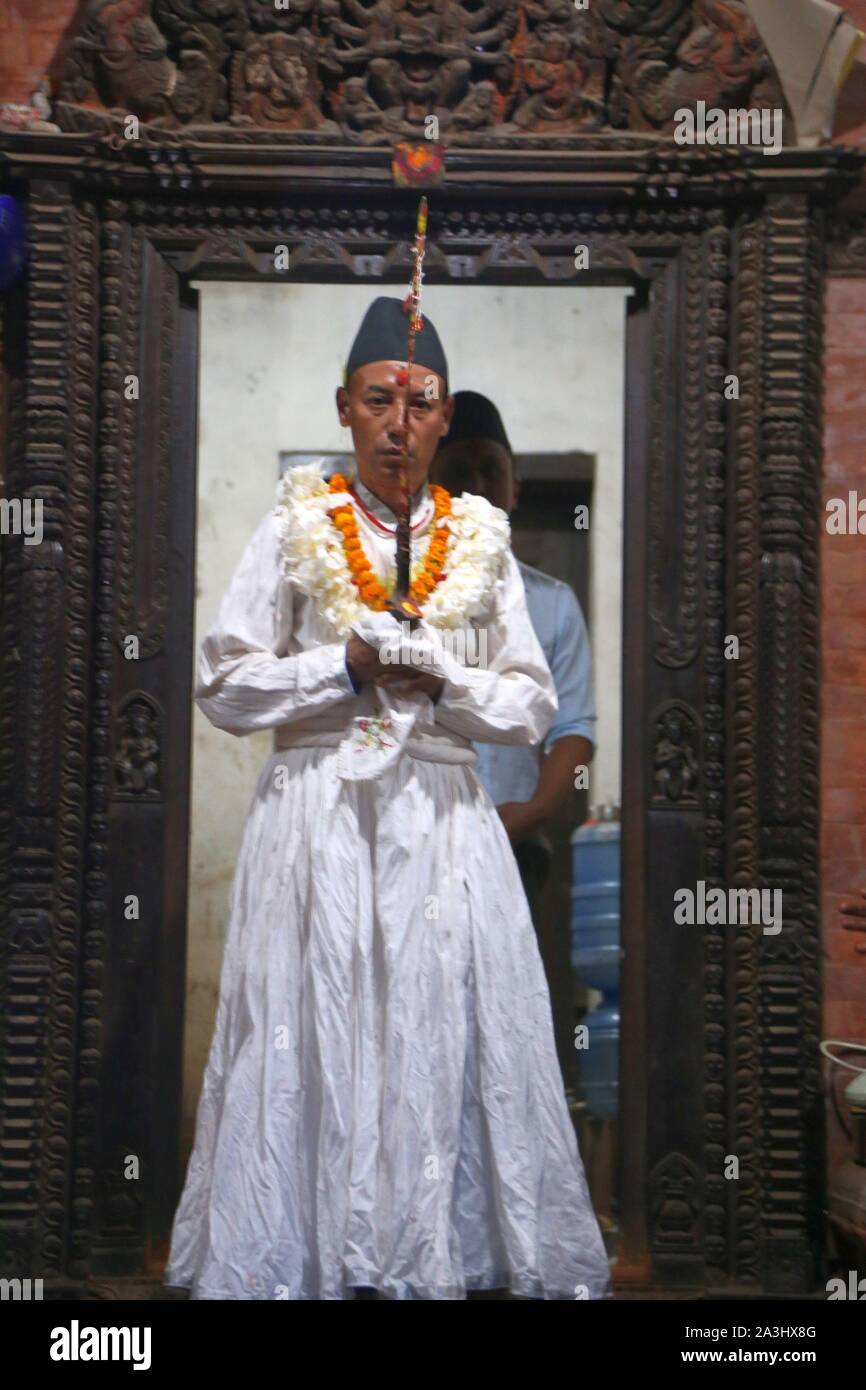 Kathmandu, Nepal. 08th Oct, 2019. A devotee dressed up as deity ...
