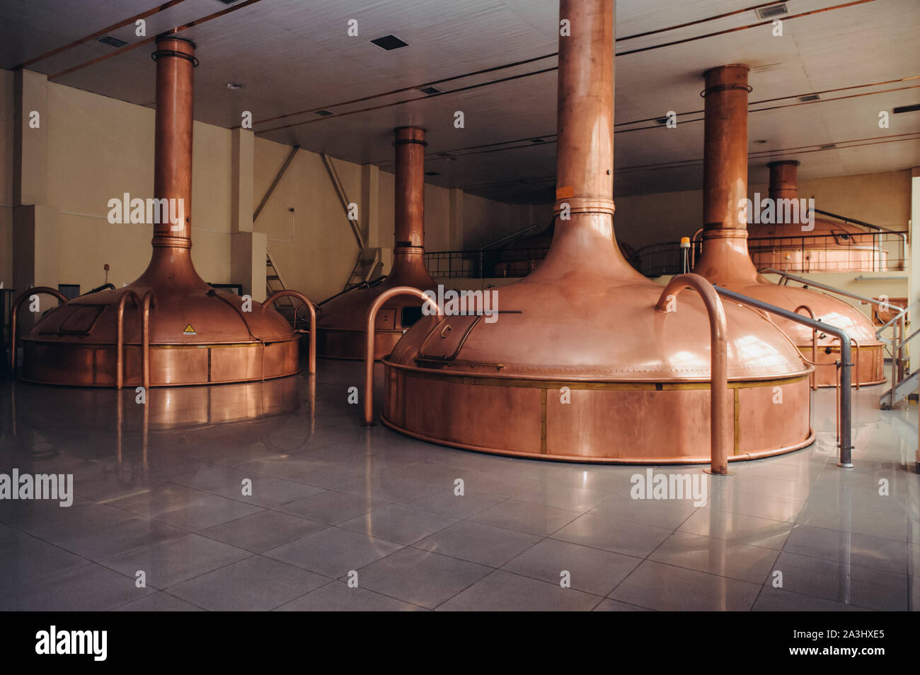 Brewing production - mash vats. Modern brewery factory interior. Steel ...