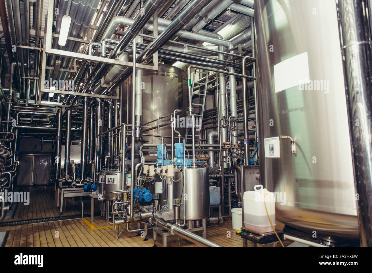 Modern brewery factory interior.Steel tanks or vats for filtration beer ...
