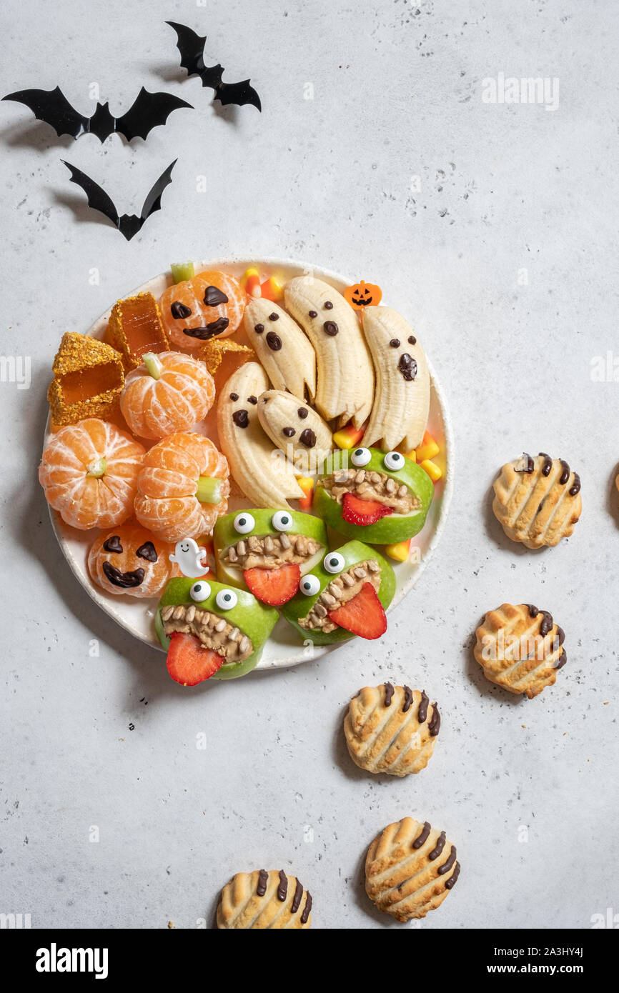 Healthy Fruit Halloween Treats. Banana Ghosts, Clementine Orange ...