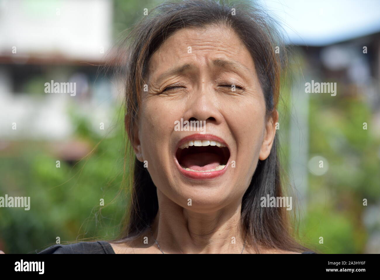 A Minority Granny Yelling Stock Photo - Alamy