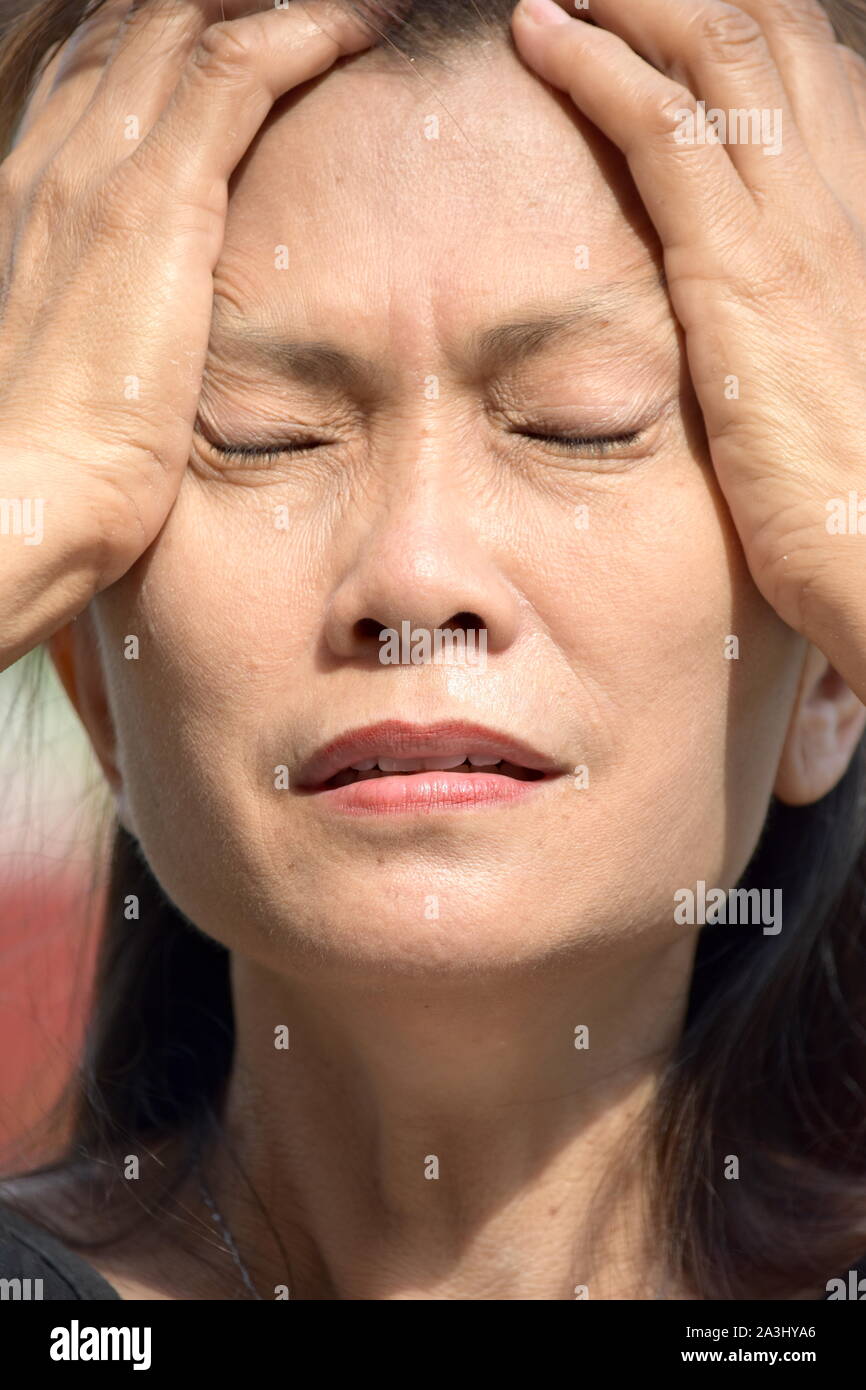 Stressed diverse female senior hi-res stock photography and images - Alamy