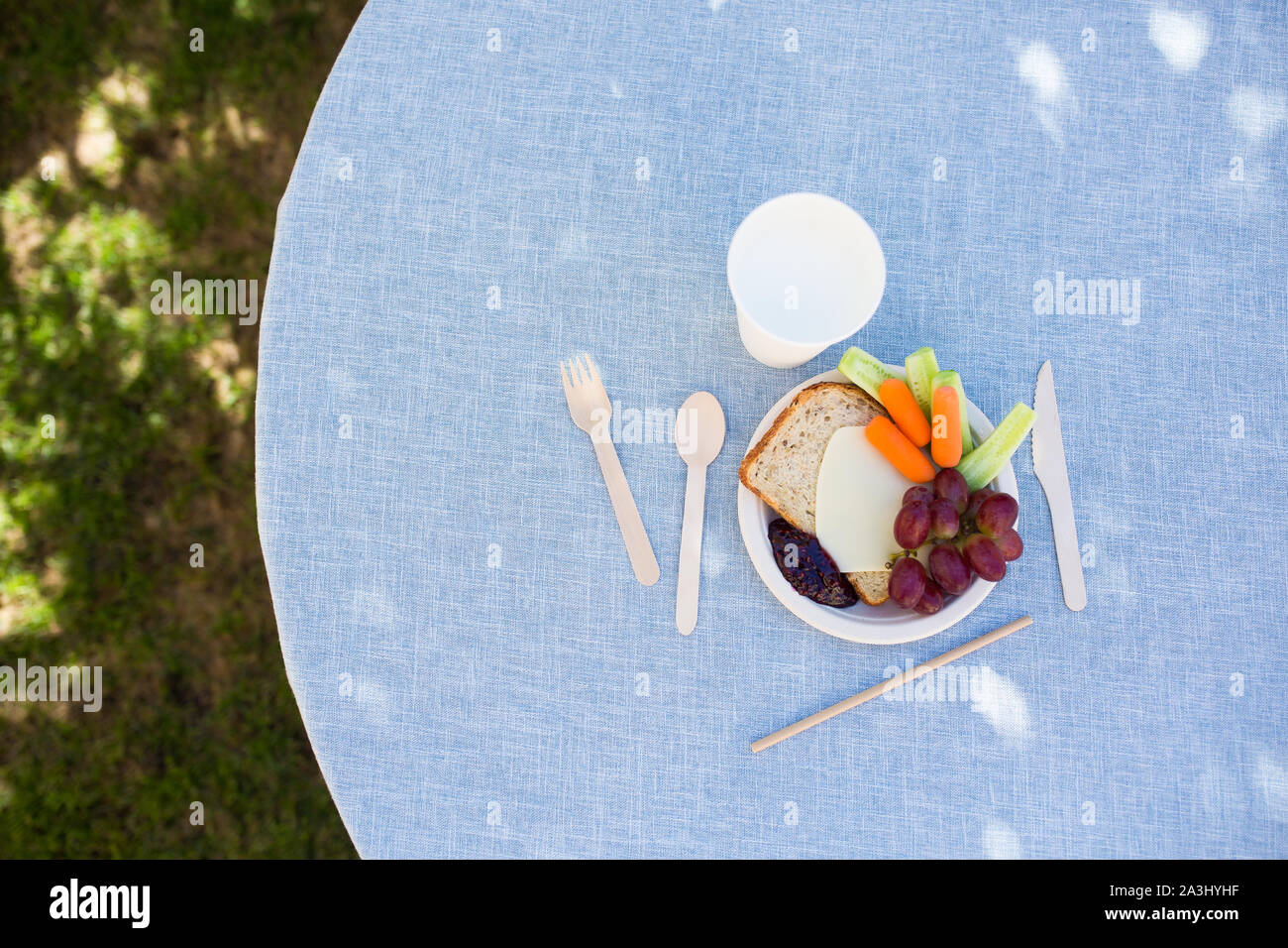 Healthy snacks served outside with disposable wooden cutlery Stock ...