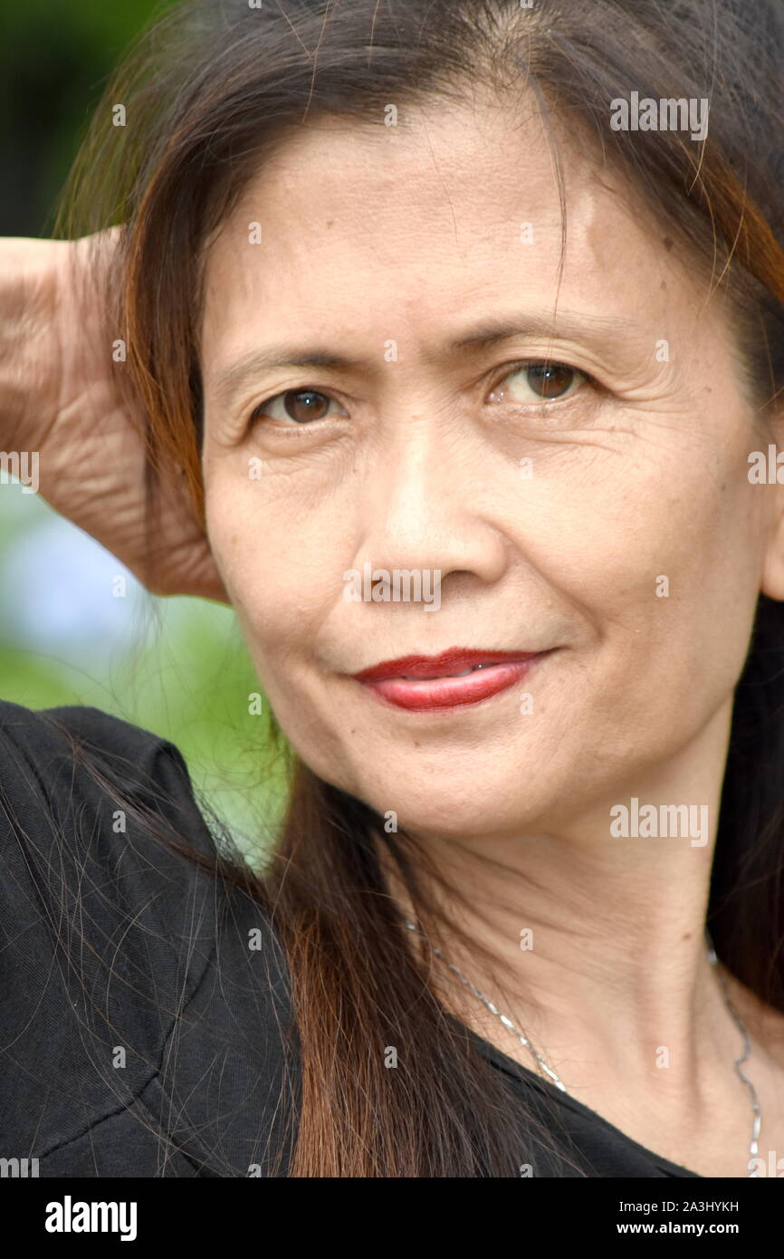 A Serious Asian Person Stock Photo - Alamy