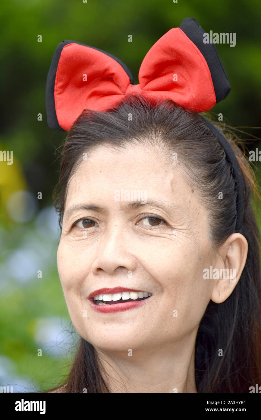 A Retired Female Senior Smiling Stock Photo - Alamy