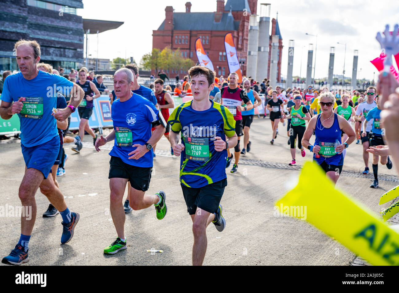 Cardiff Half Marathon: Runners and crowds raise money for charity ...