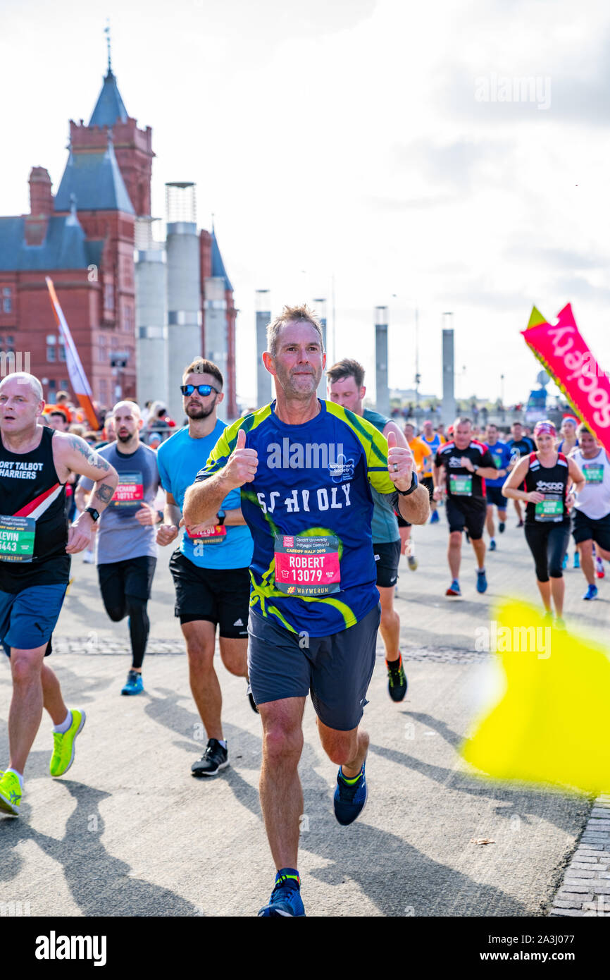 Cardiff Half Marathon: Runners and crowds raise money for charity ...